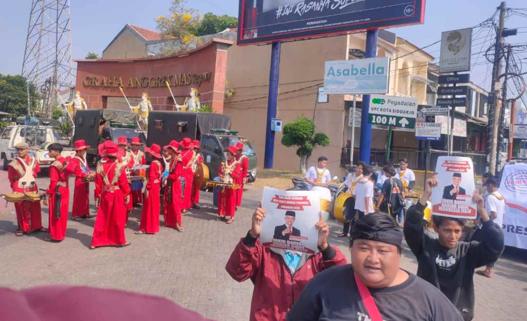 Relawan Ganjar Gelar Parade Musik Patrol di Sela Ribuan Massa Anis ...